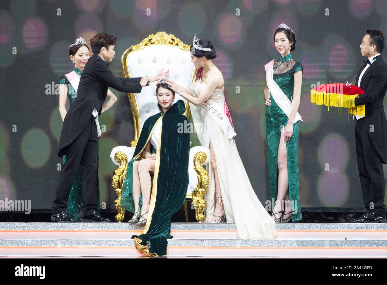 Contestants pose during the 2019 Miss Macau Pageant contest in Macau ...