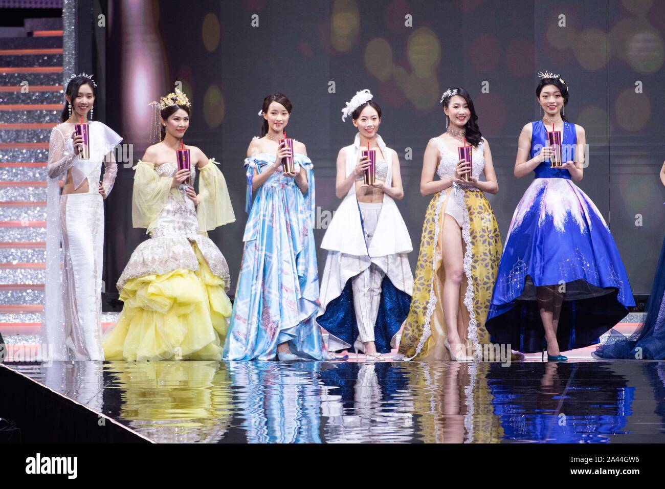 Contestants pose during the 2019 Miss Macau Pageant contest in Macau ...