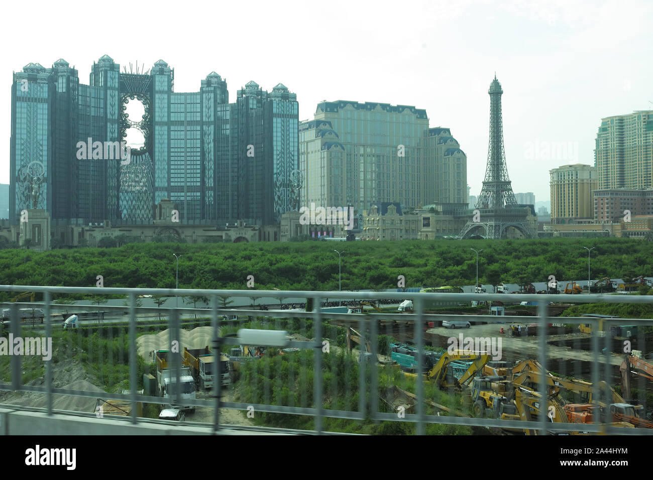 Chinese workers introduce the Light Rail Transit (LRT) system at the ...