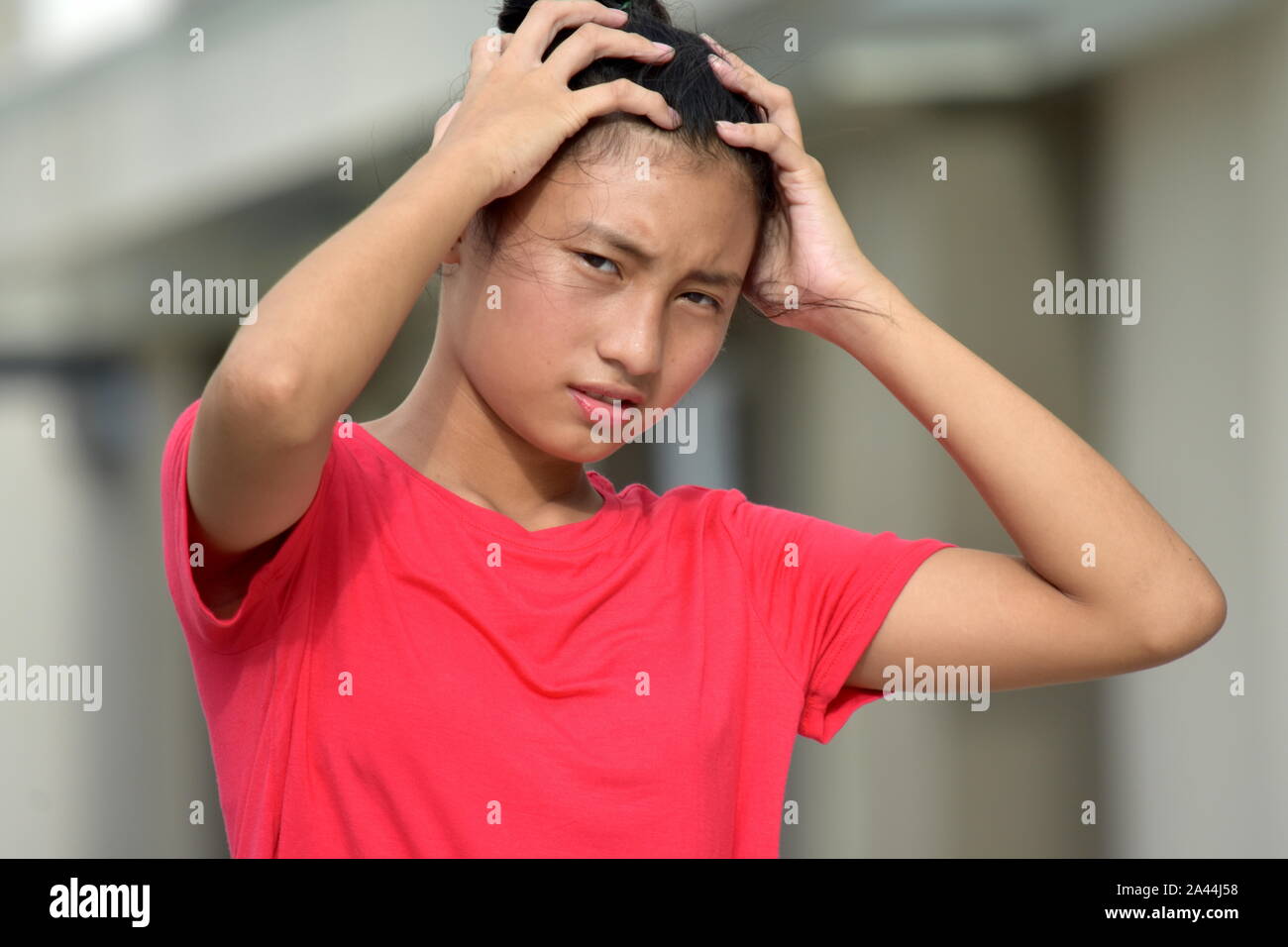 Girl And Confusion Stock Photo - Alamy