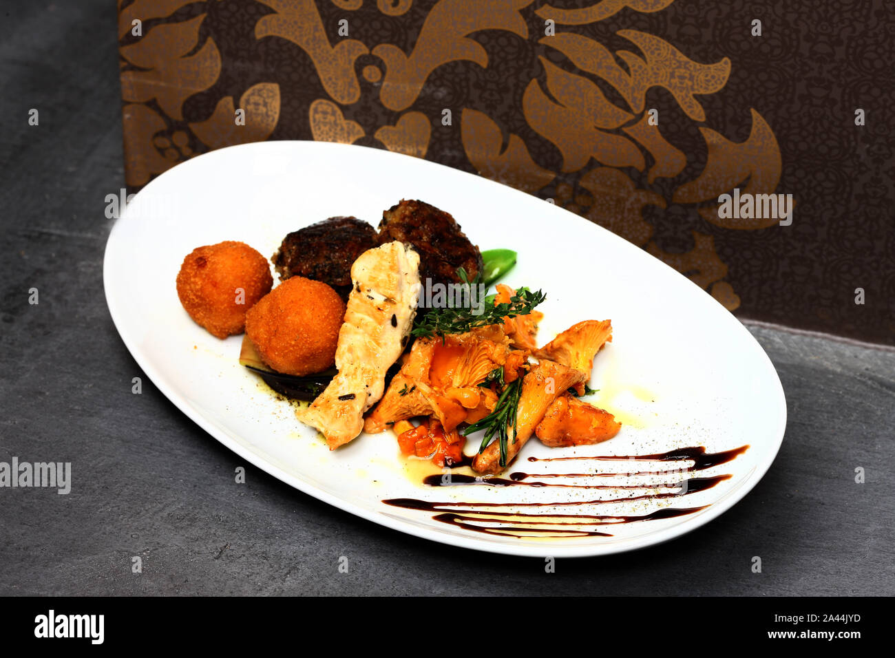 food on a plate, ready to be served to guests Stock Photo - Alamy