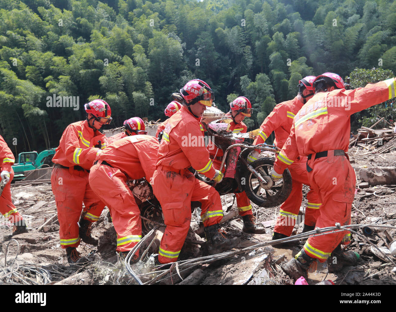 Rescuers conduct rescue operation in landslide area caused by Typhoon ...