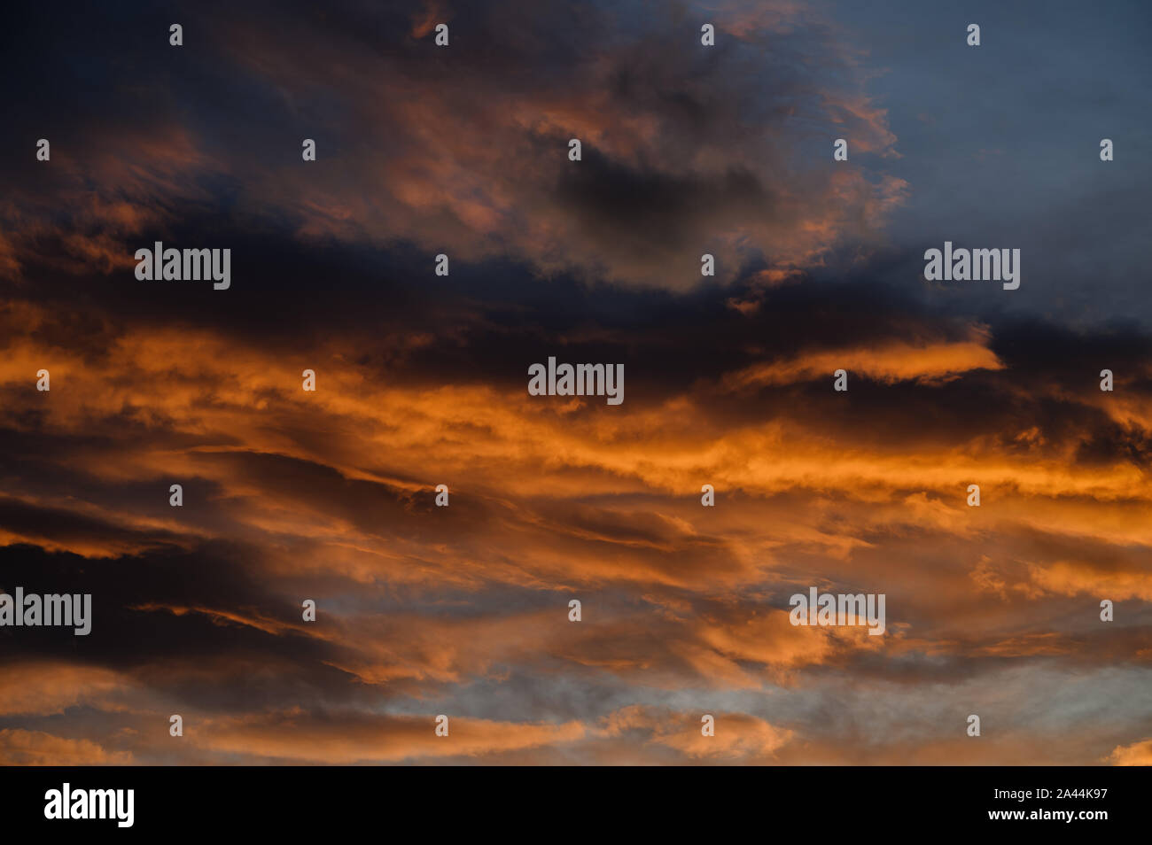 Dramatic sky with orange clouds. Nature background Stock Photo - Alamy