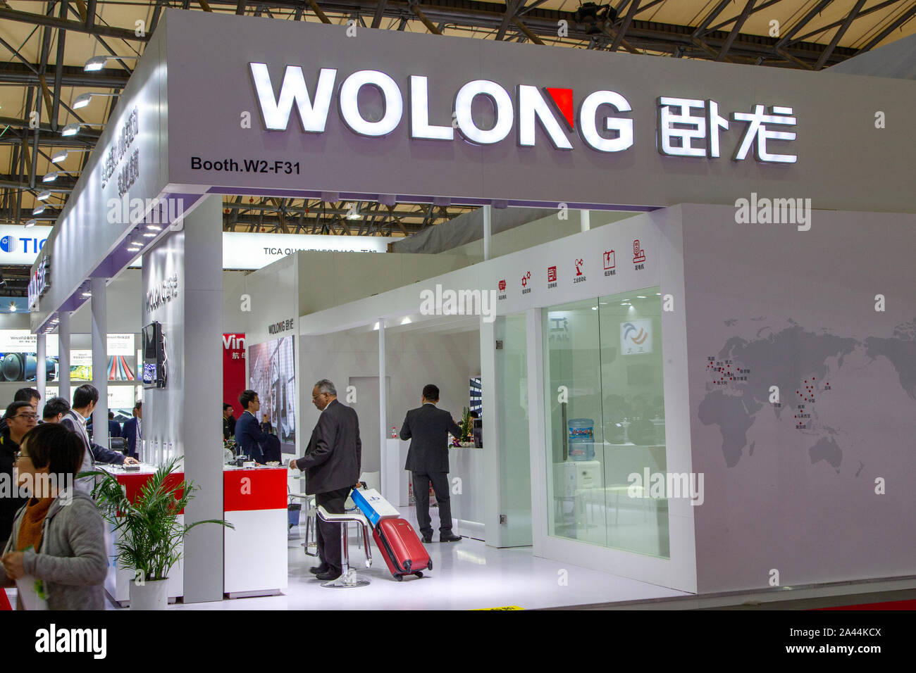 --FILE--People visit the stand of Wolong LDG during an expo in Shanghai ...