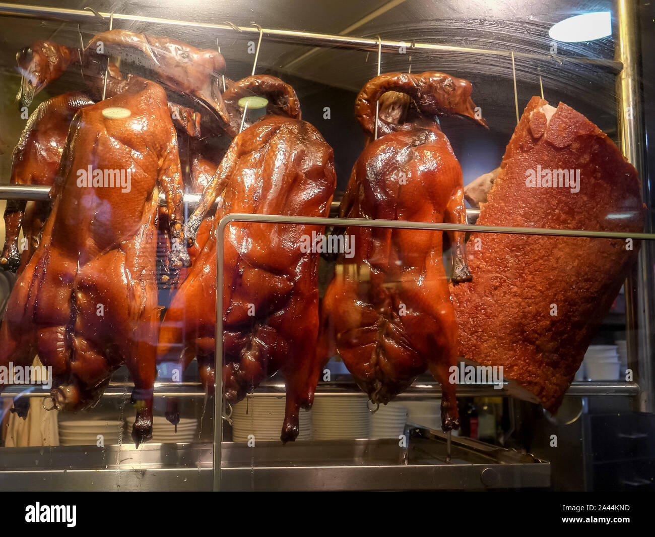 cooked peking geese in a hong kong restaurant Stock Photo - Alamy