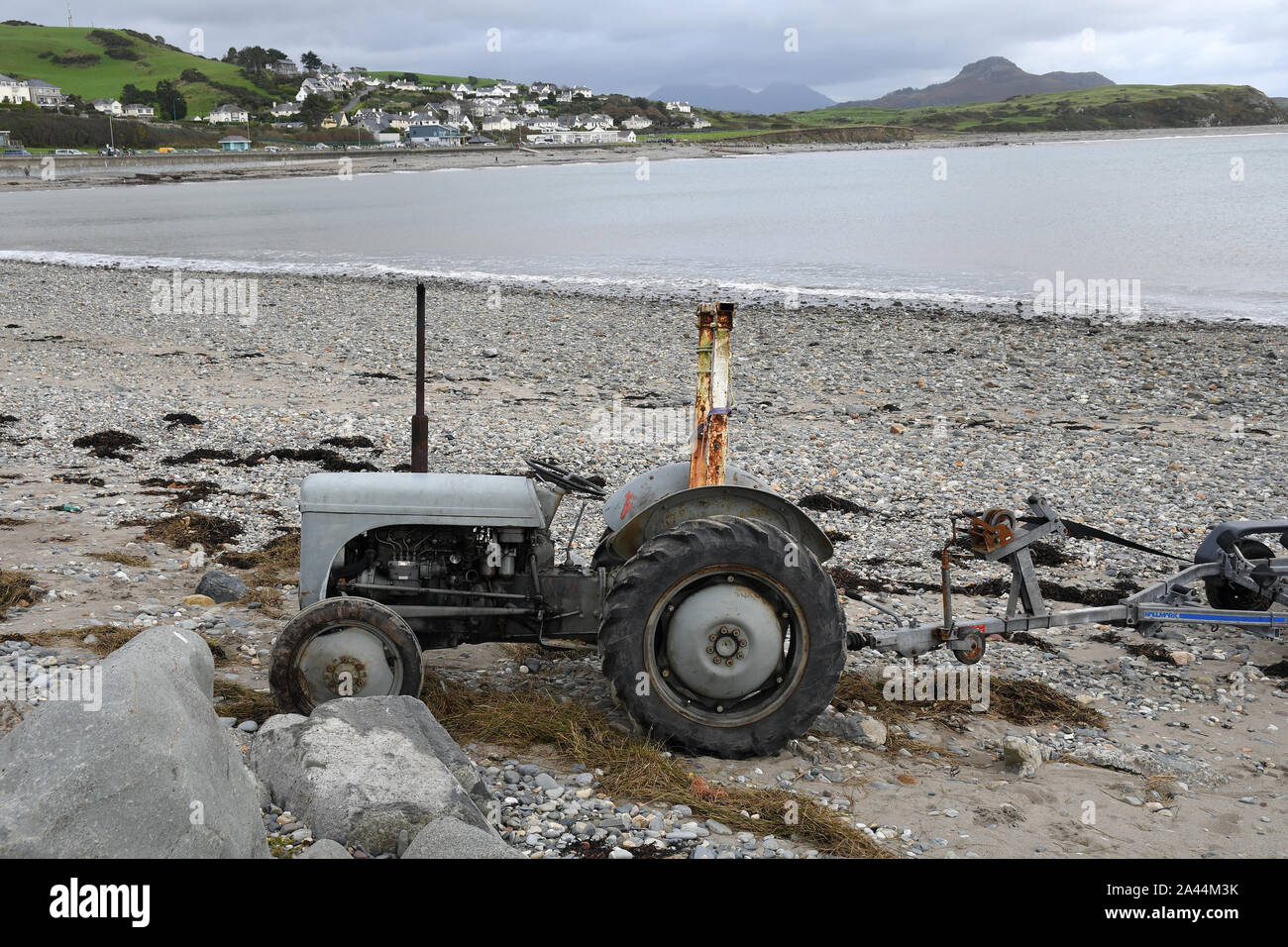 Tractor on beach Stock Photo - Alamy