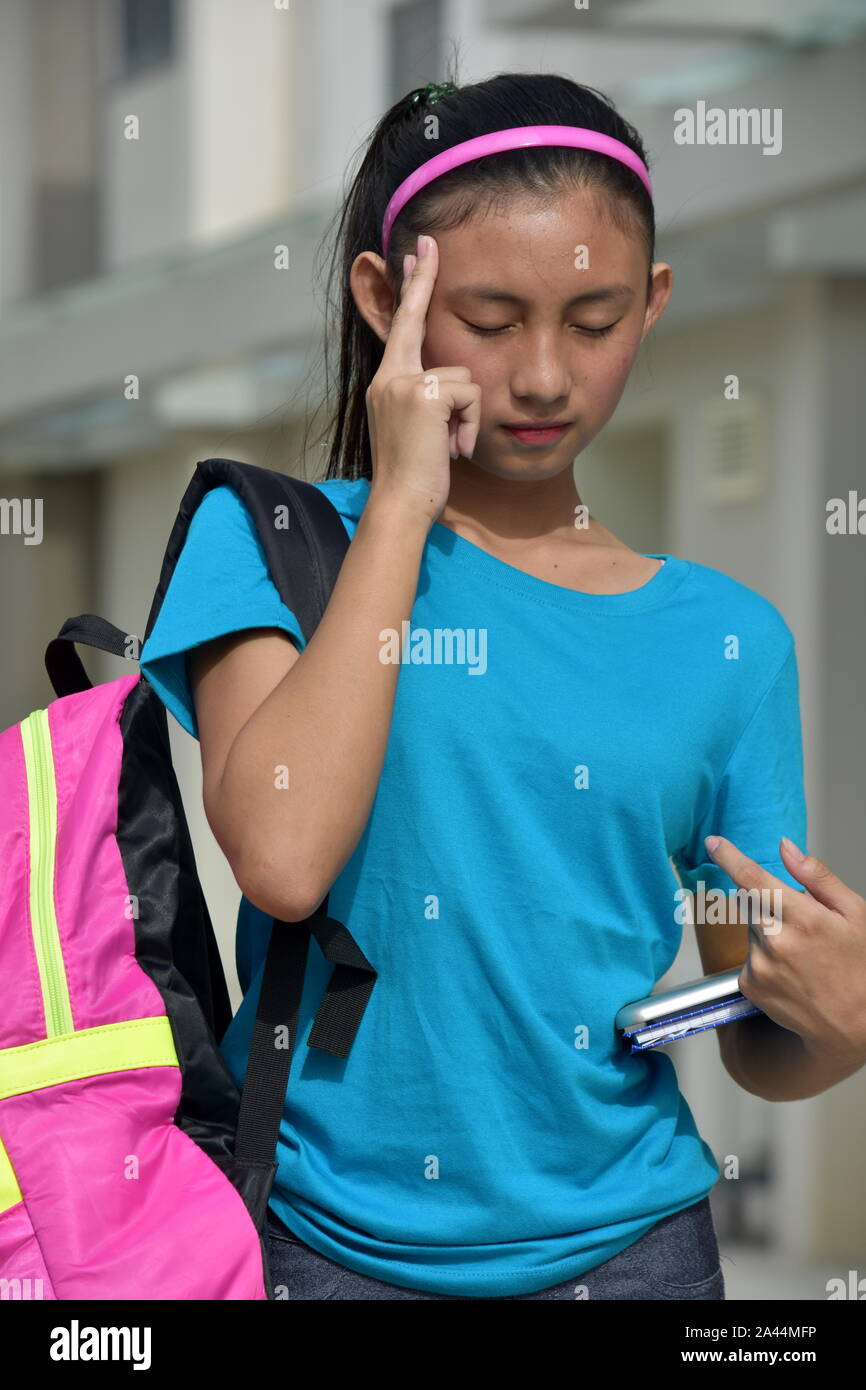 Beautiful School Girl Making A Decision Stock Photo - Alamy