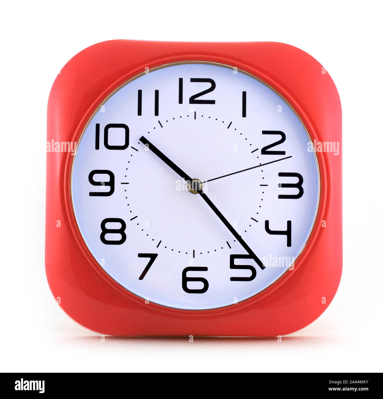 Small red alarm clock isolated on white background Stock Photo - Alamy