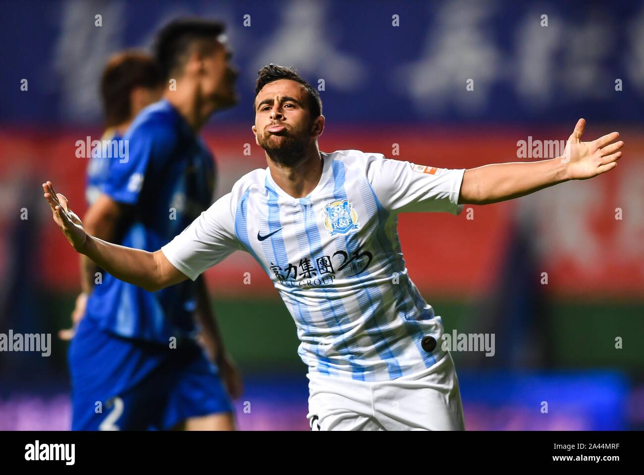 Israeli-Arab football player Dia Saba of Guangzhou R&F celebrates after ...