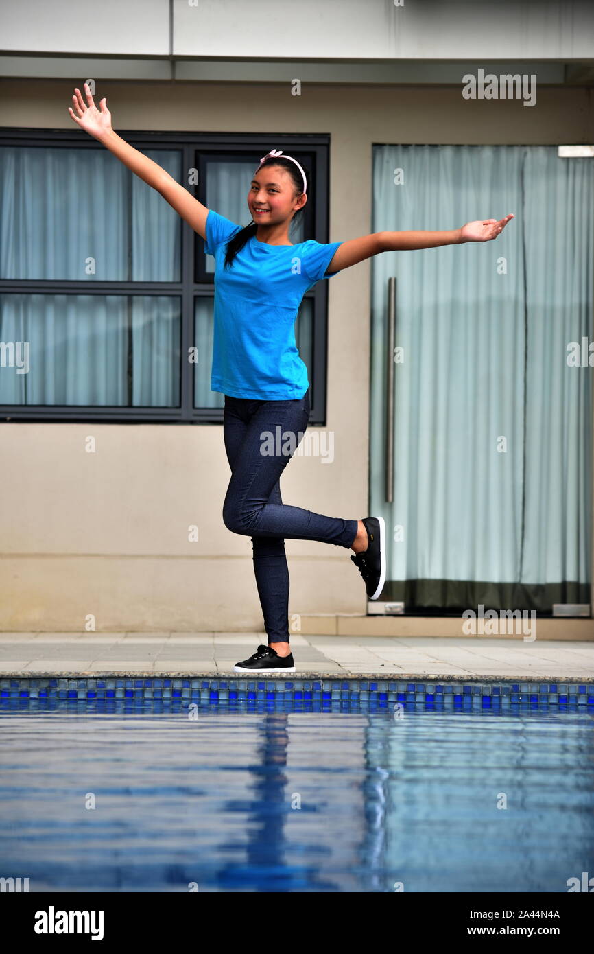 Girl Having Fun Standing Stock Photo - Alamy