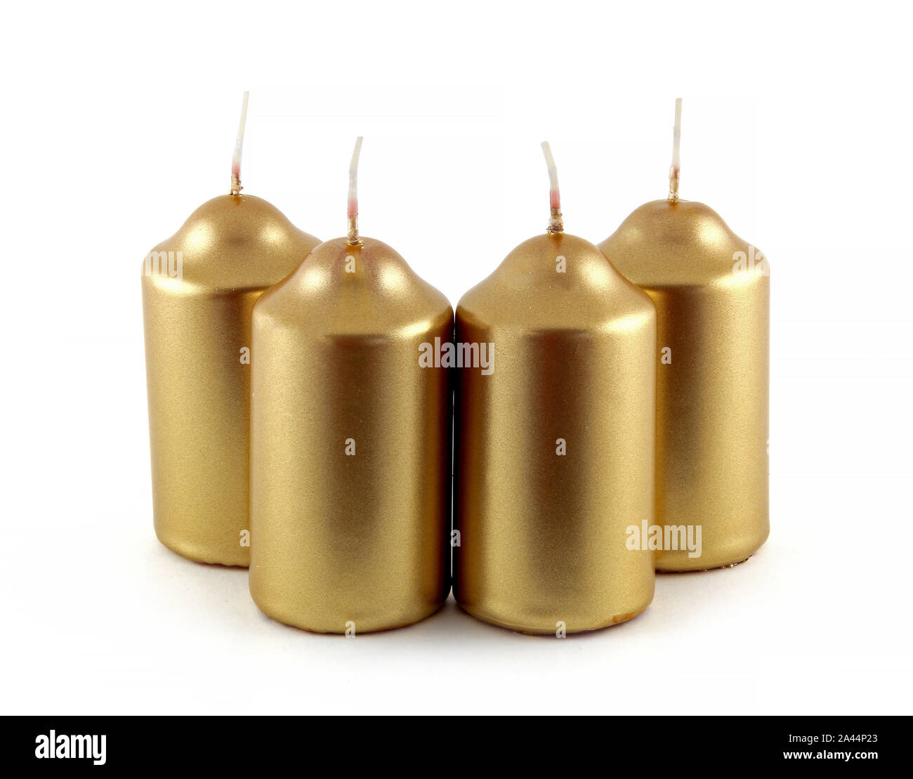 Christmas candles in gold color. They are decorative candles Stock ...