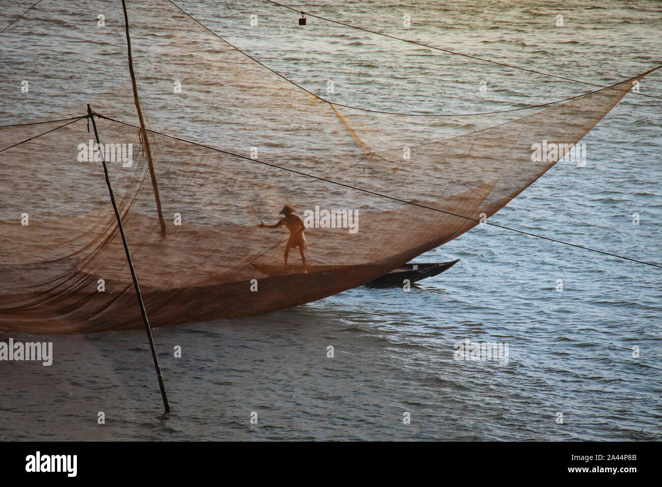Traditional Vietnamese fishing method using sitting nets or stationary ...
