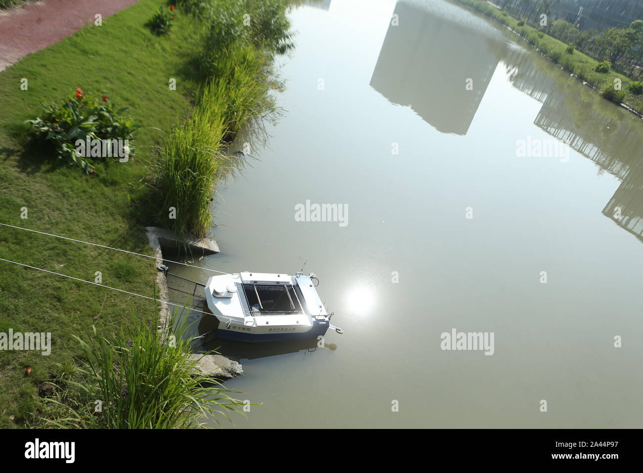 A remote-controlled unmanned vessel able to collect garbage from water ...