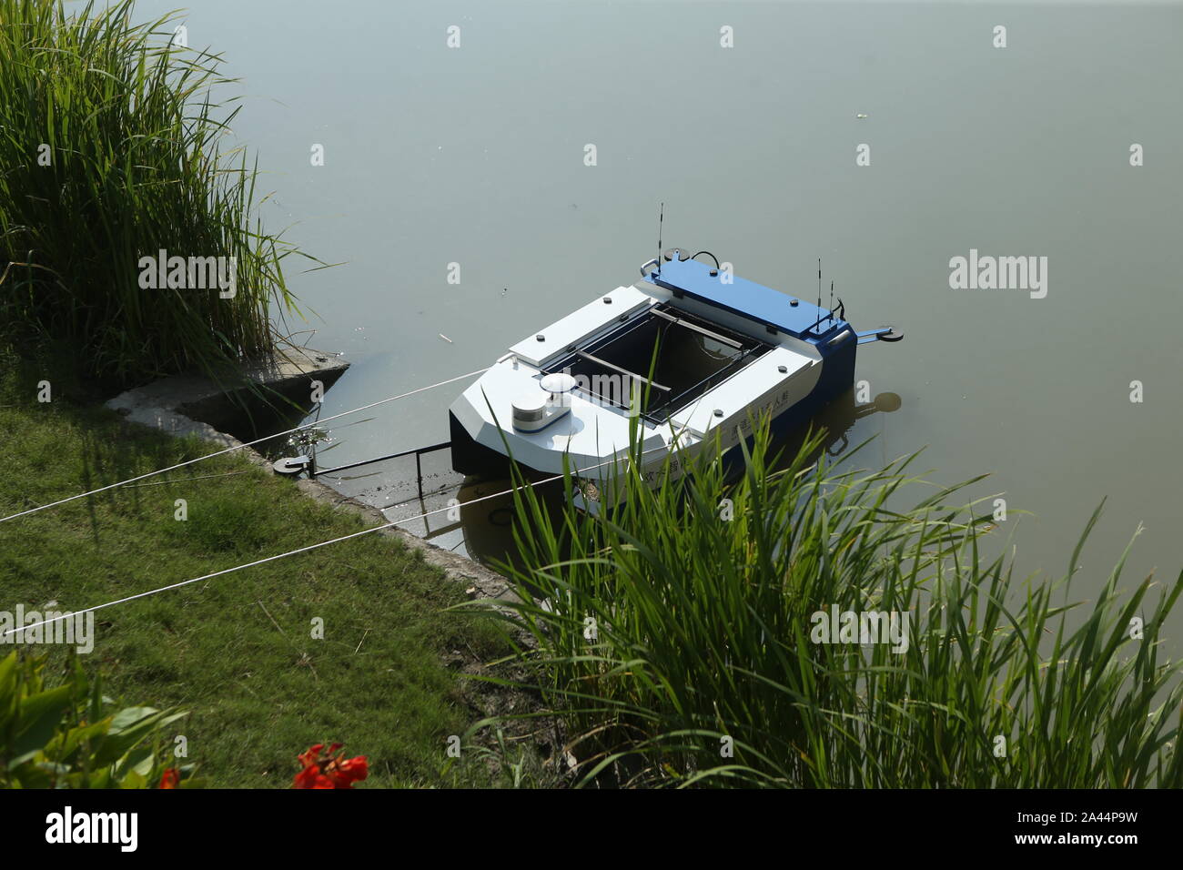 A remote-controlled unmanned vessel able to collect garbage from water ...