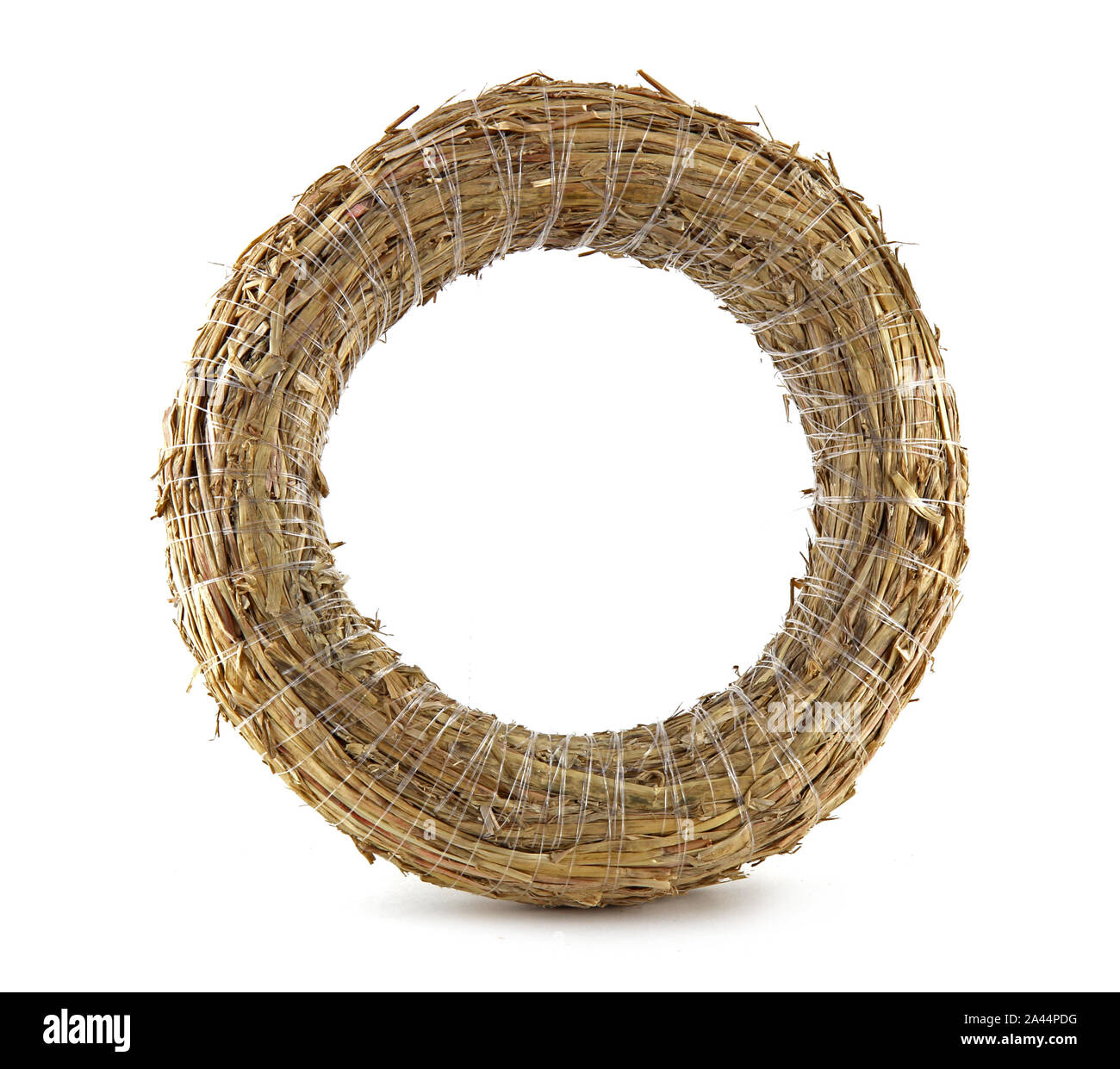 Christmas wreath made of straw on white background. It is the basis for ...