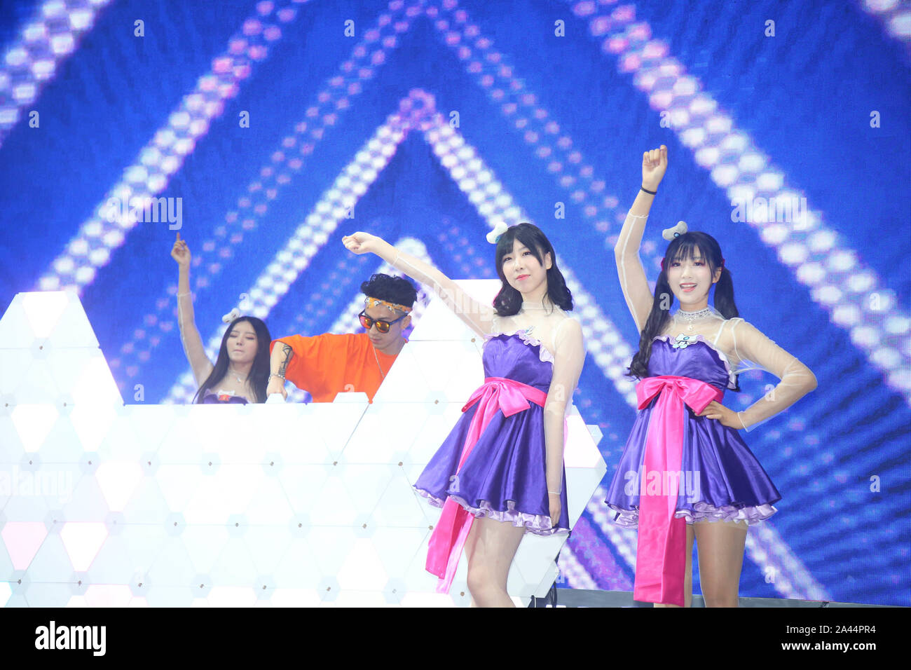 Chinese showgirls pose during the 17th China Digital Entertainment Expo ...