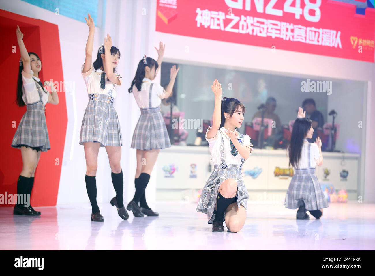 Chinese showgirls pose during the 17th China Digital Entertainment Expo ...
