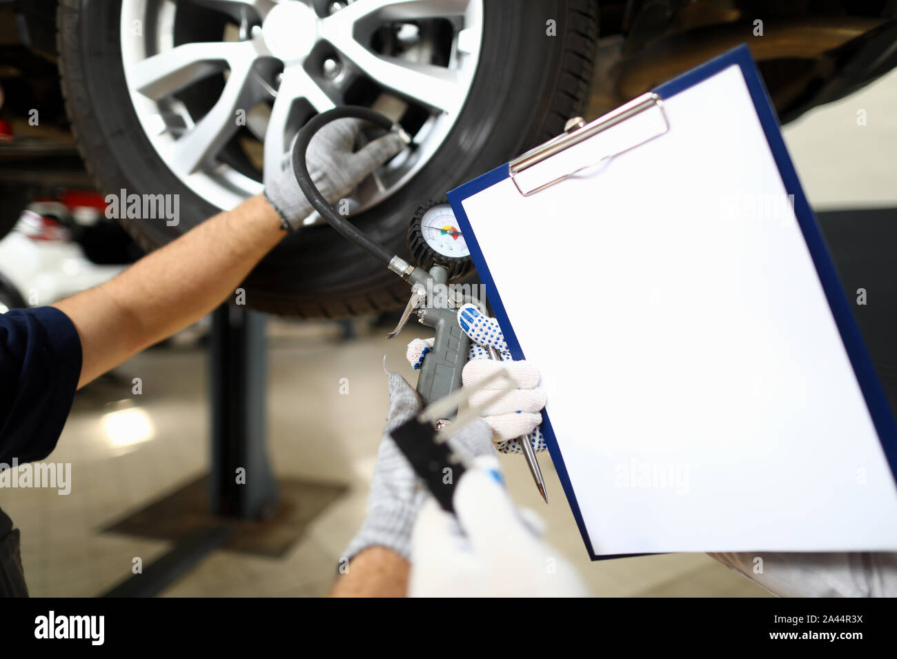 Repairing helping hand Stock Photo - Alamy