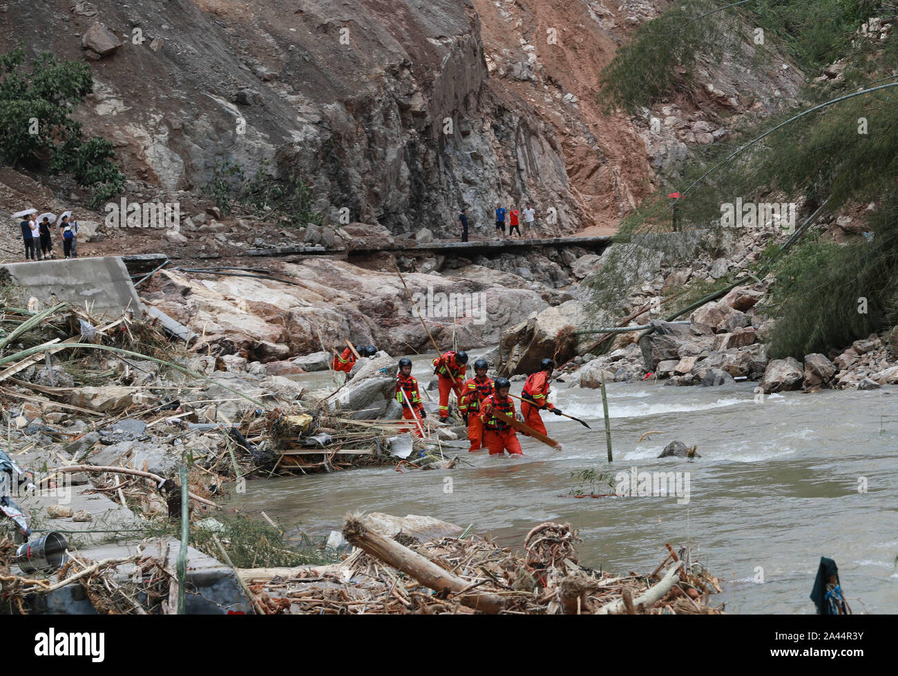 Rescuers conduct rescue operation in landslide area caused by Typhoon ...