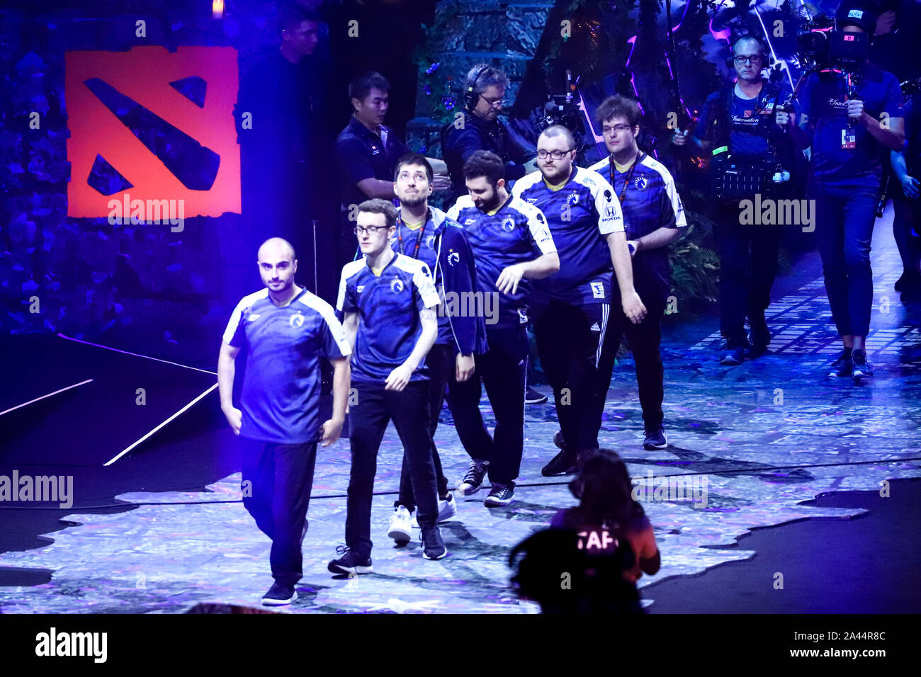 Members of OG and Liquid step into the stage at the final of TI9 in ...