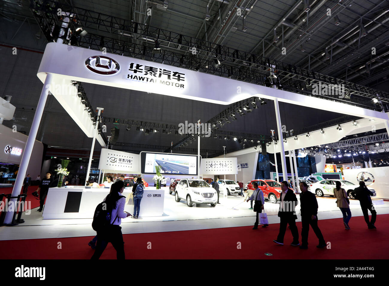 --FILE--People visit the stand of Hawtai Motor during the 16th Shanghai ...