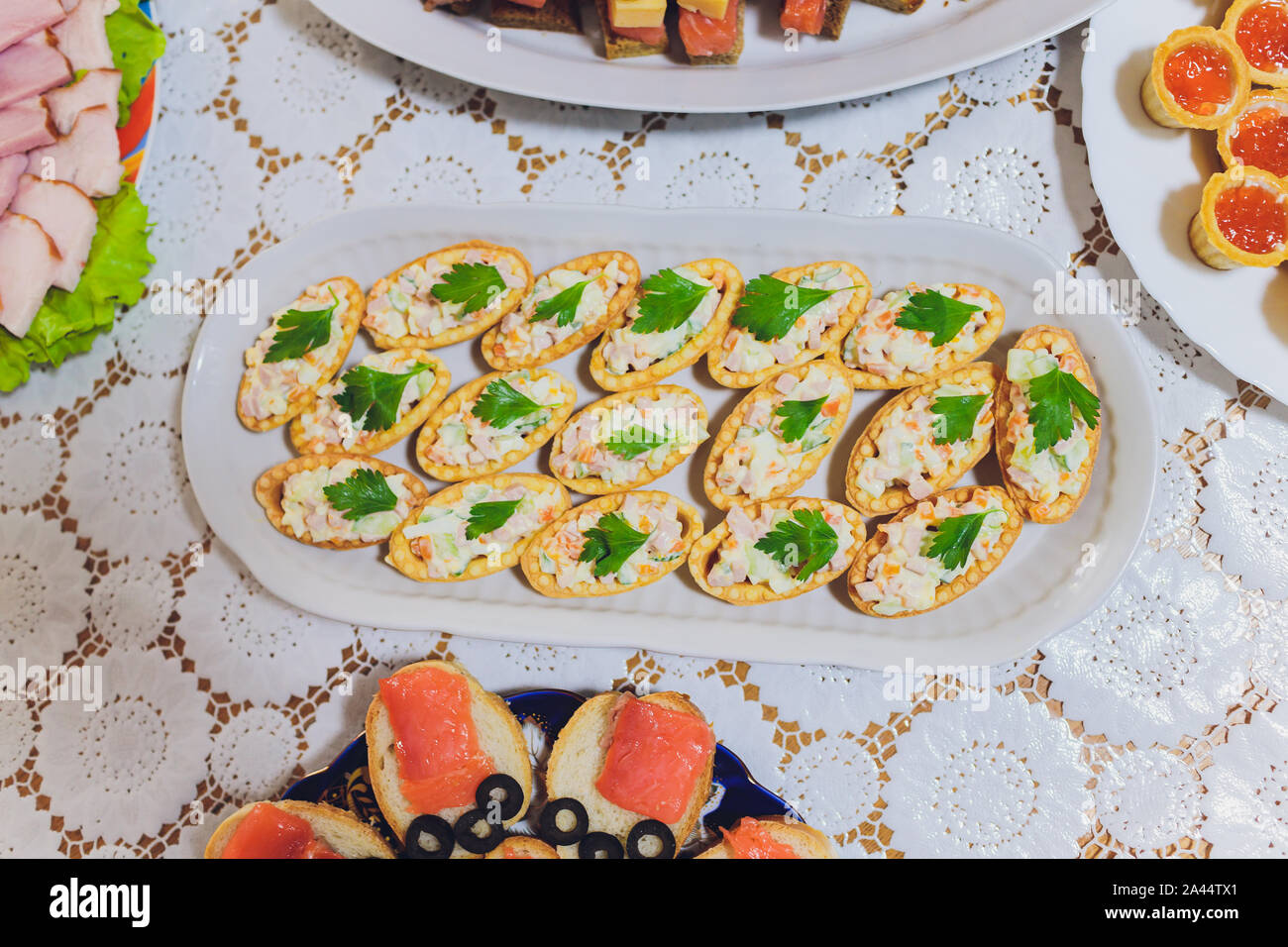 Different types of canapes on buffet table Stock Photo - Alamy
