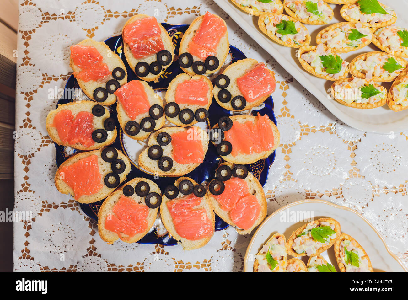 Different types of canapes on buffet table Stock Photo - Alamy