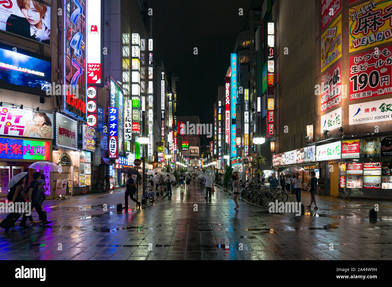 Tokyo, Japan - August 29, 2016: Night Shinjuku with people and bright ...