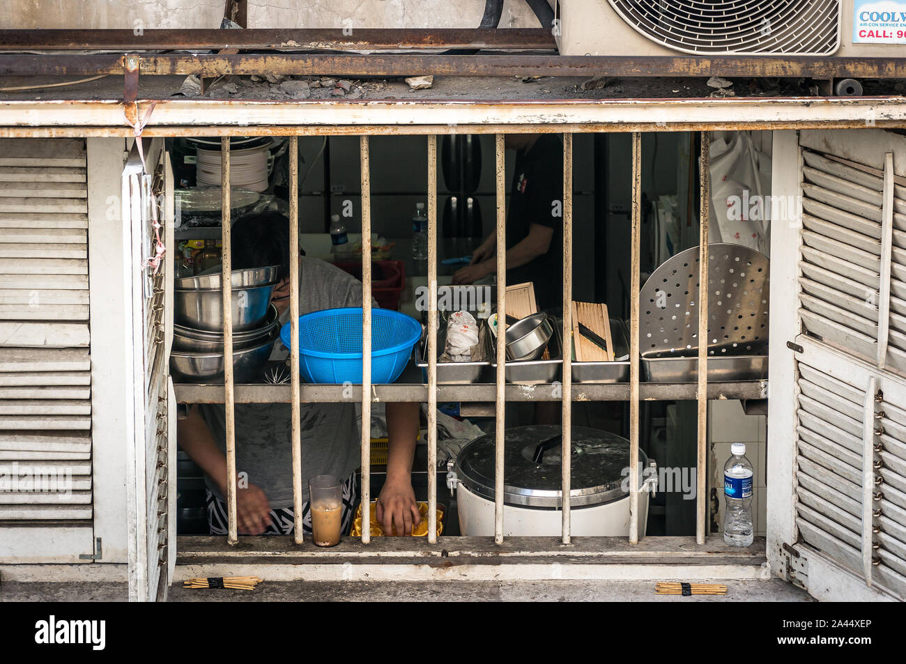 SINGAPORE/SINGAPORE - DEC 23, 2015: Backstreet window of unidentified ...
