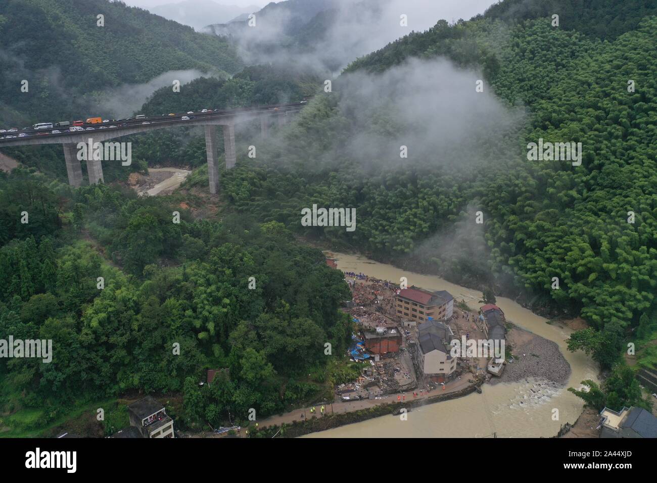 The residential buildings are surrounded by floodwater after a ...