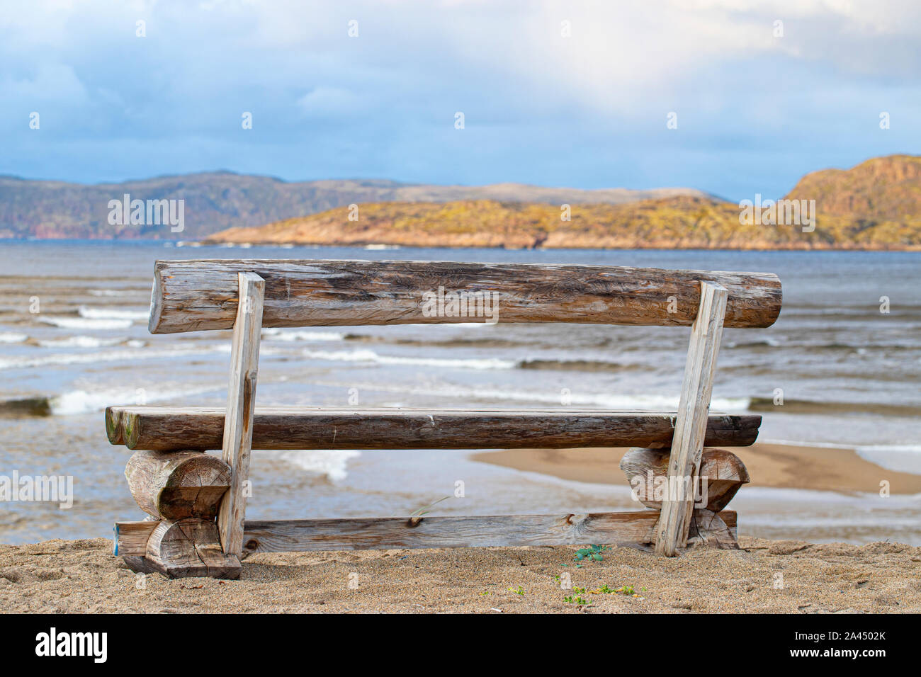 Bench on the beach at the sea Stock Photo - Alamy