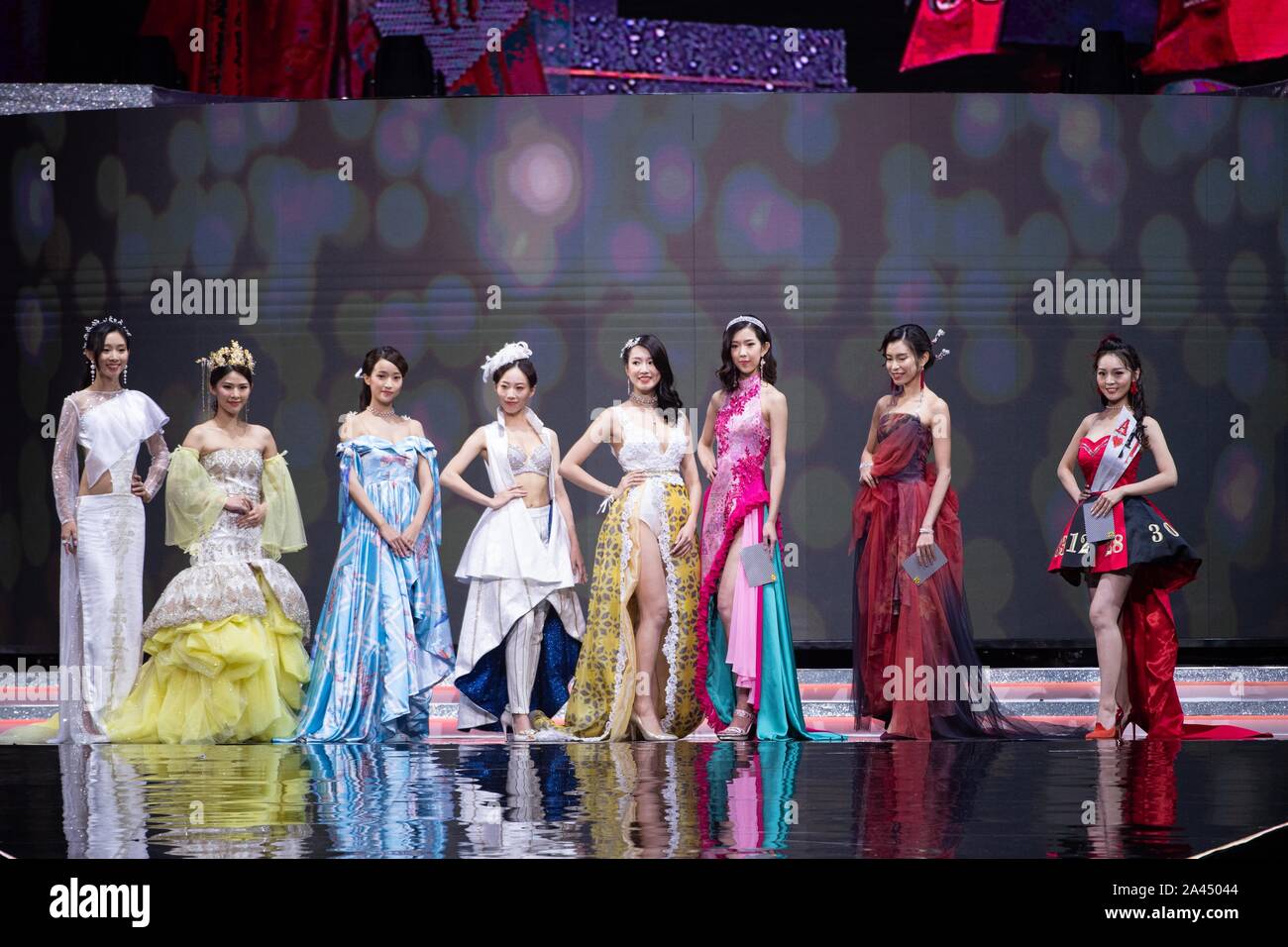 Contestants pose during the 2019 Miss Macau Pageant contest in Macau ...