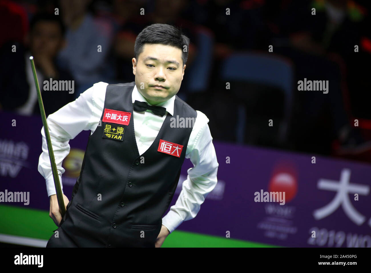 Ding Junhui of China considers a shot to Mark Allen of Northern Ireland ...