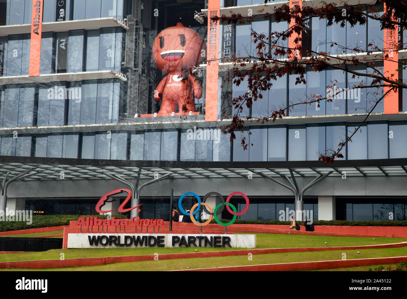 --FILE--Employees walk towards an office building of Alibaba Group in ...