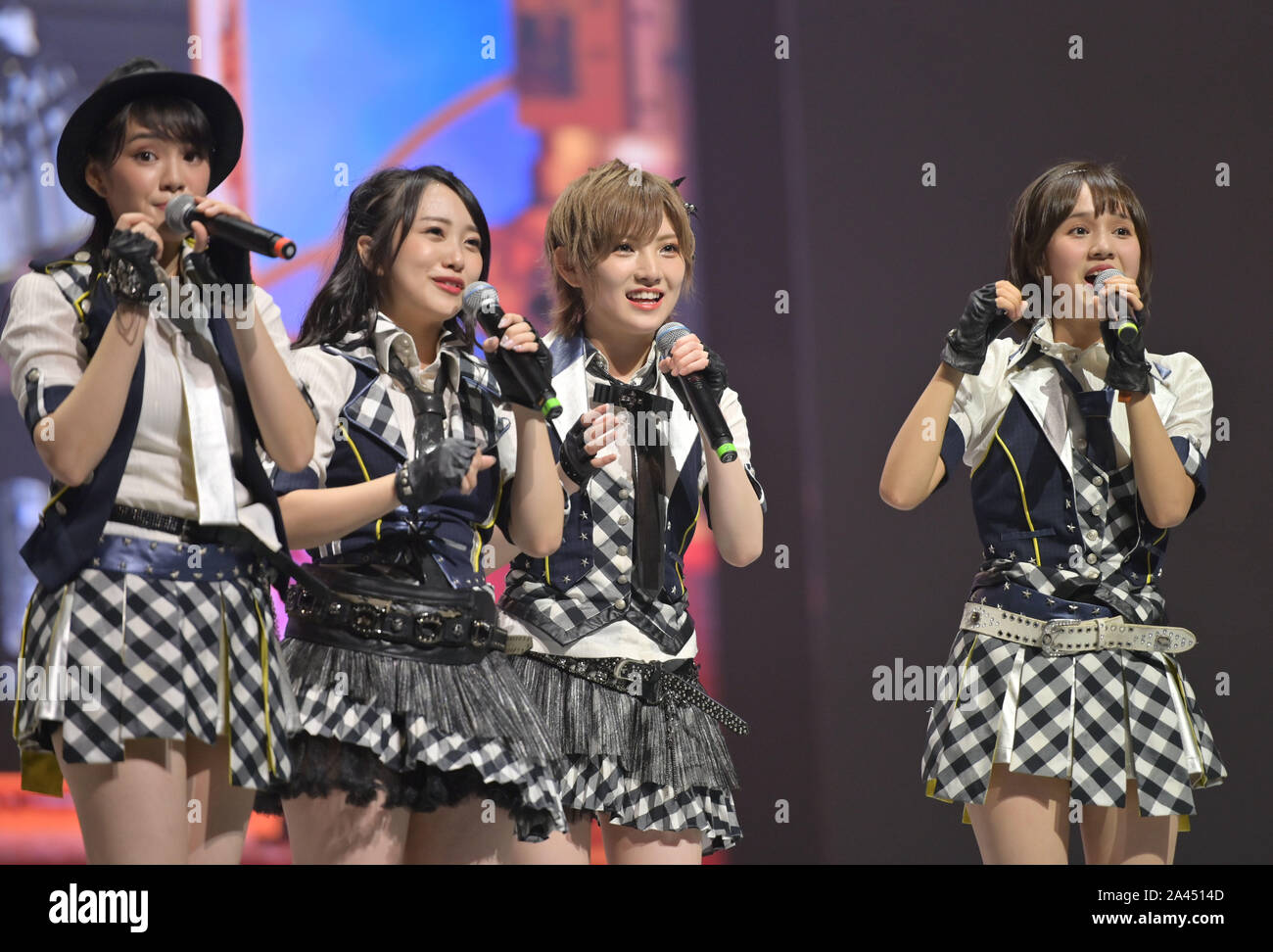 Members of Japanese idol girl group AKB48 and its international sister groups perform during the ...