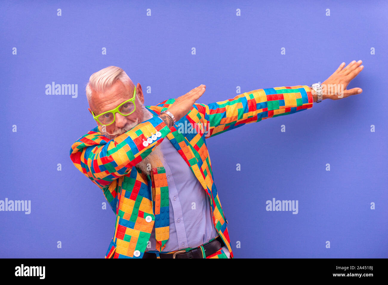 Senior man with eccentric look - Youthful hipster man with beard ...