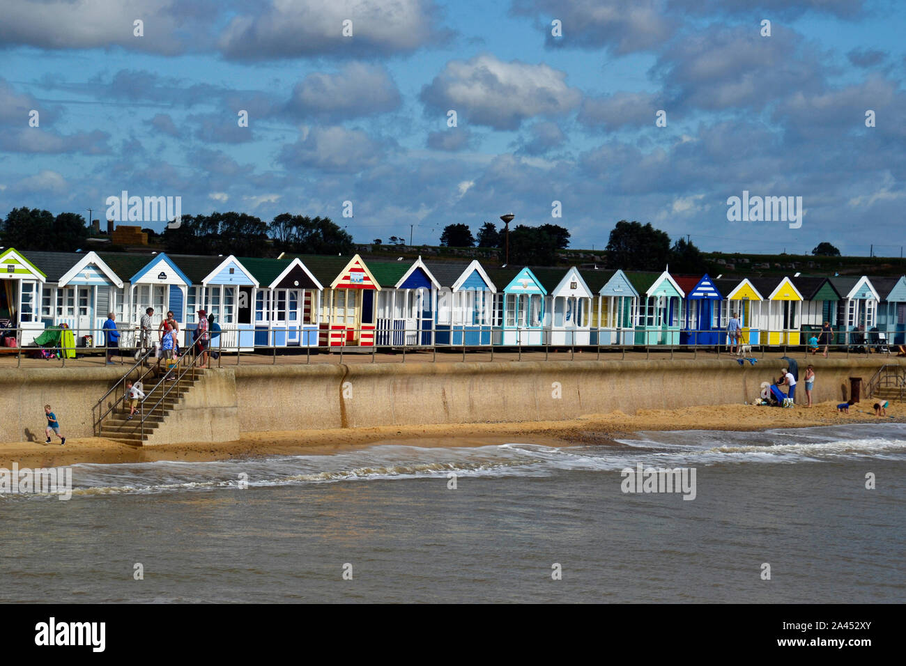 Seaside uk beach huts pier hi-res stock photography and images - Alamy
