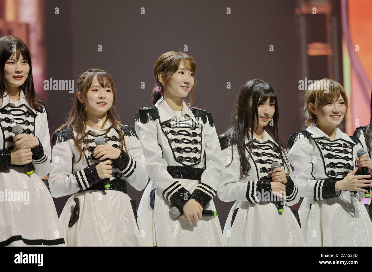 Members of Japanese idol girl group AKB48 and its international sister groups perform during the ...