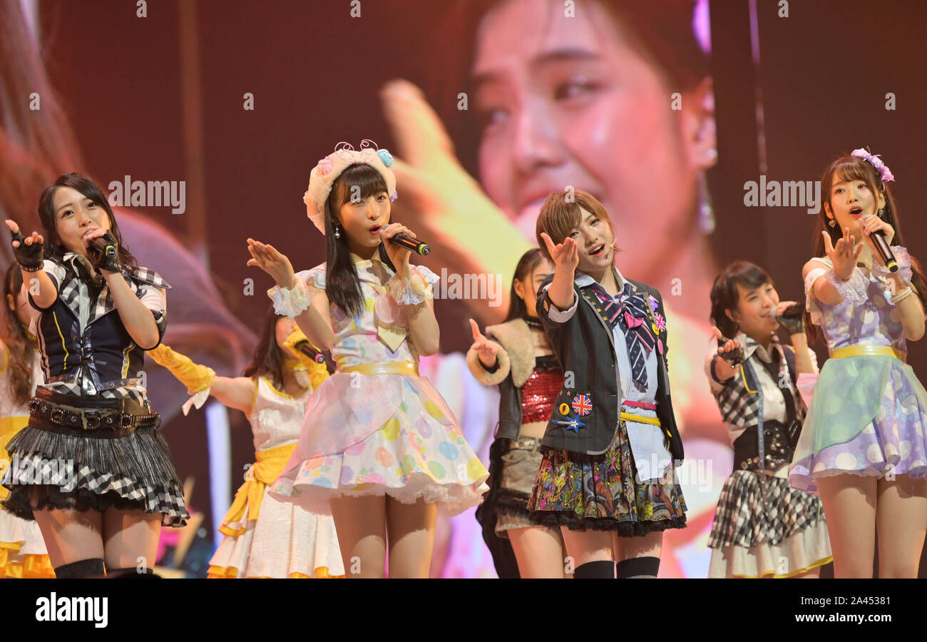 Members of Japanese idol girl group AKB48 and its international sister groups perform during the ...