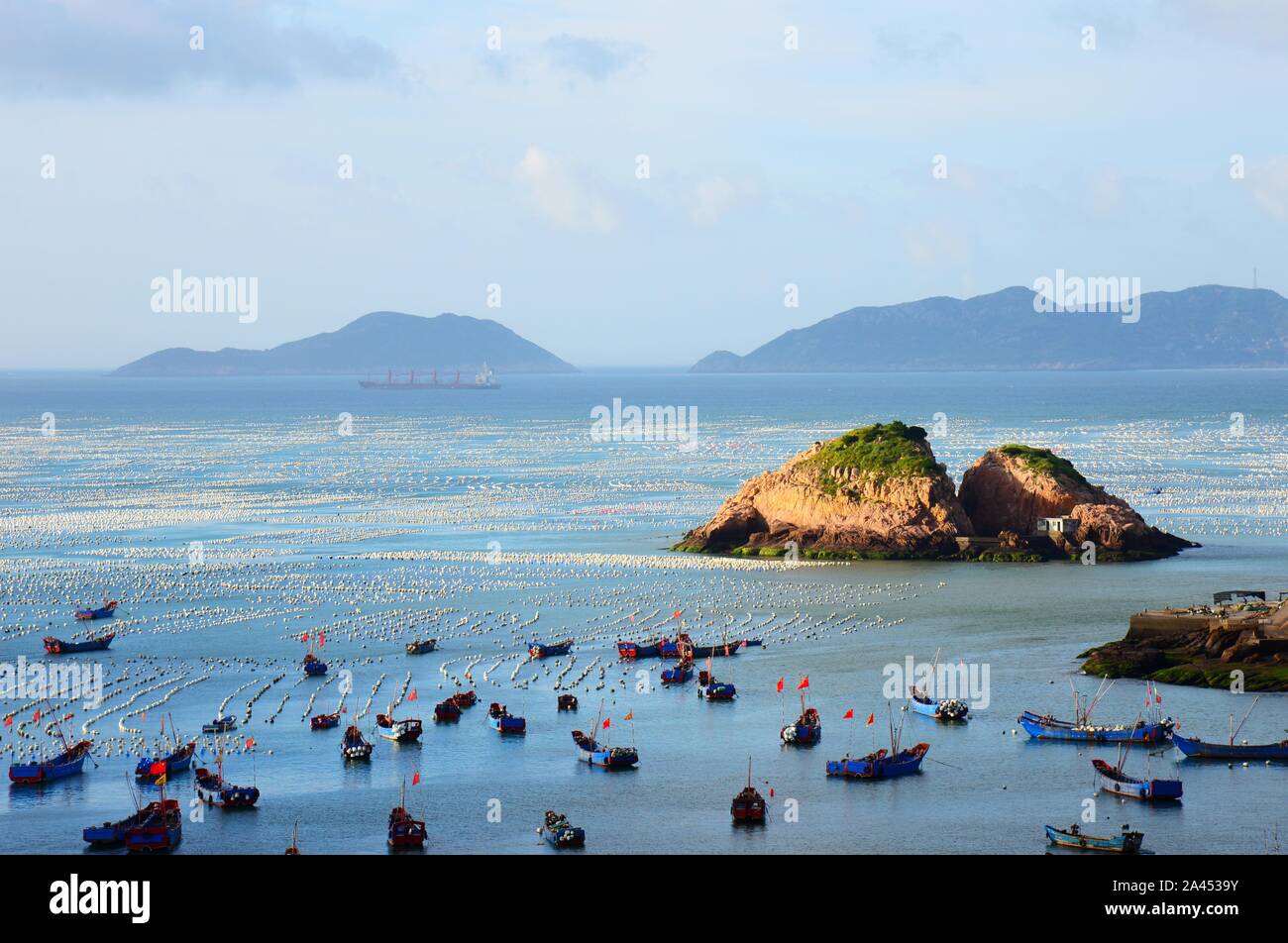 Fishing boats float around Goqi Island, the center of China's largest ...