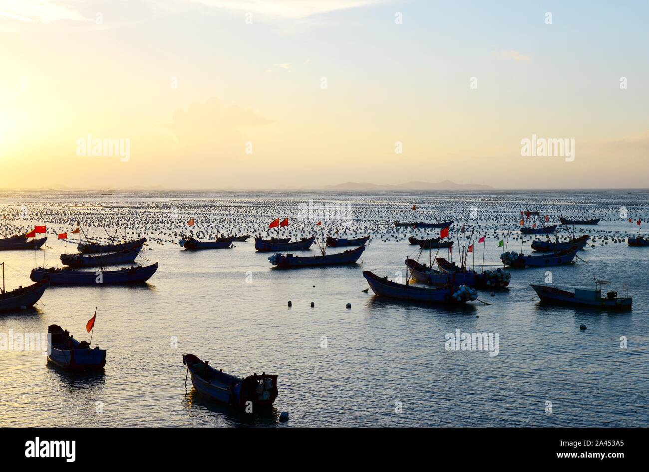 Fishing boats float around Goqi Island, the center of China's largest ...
