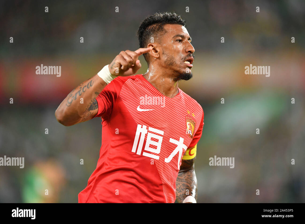 Brazilian football player Paulinho of Guangzhou Evergrande Taobao F.C ...