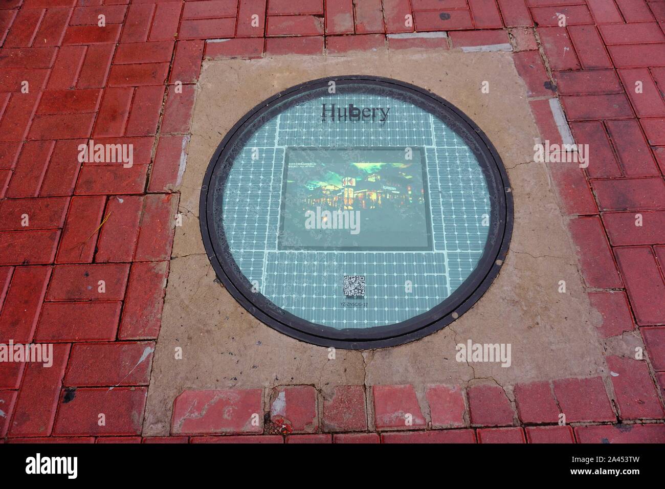 A smart well lid appears and attract attention of pedestrian at West ...
