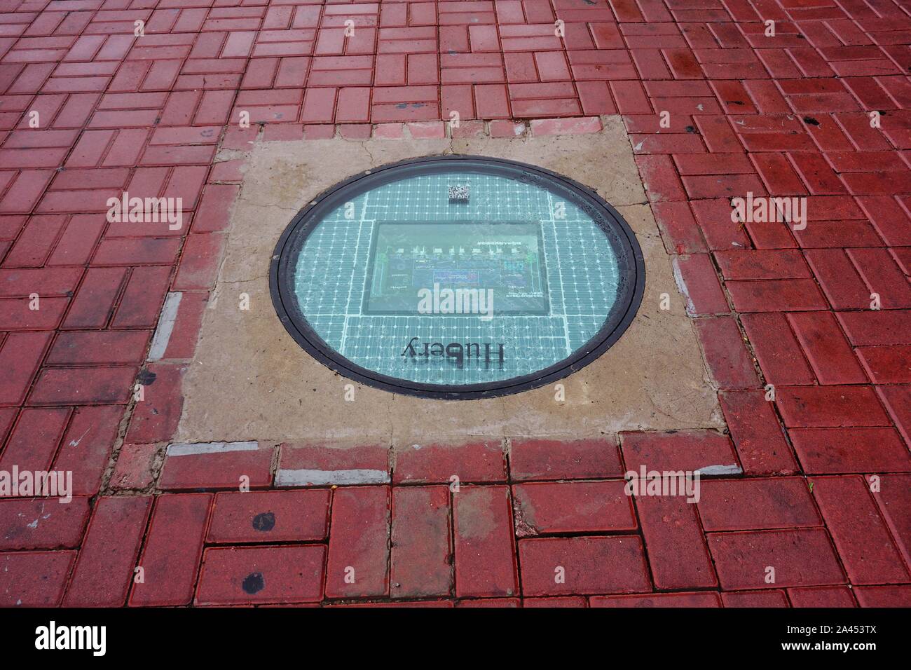 A smart well lid appears and attract attention of pedestrian at West ...