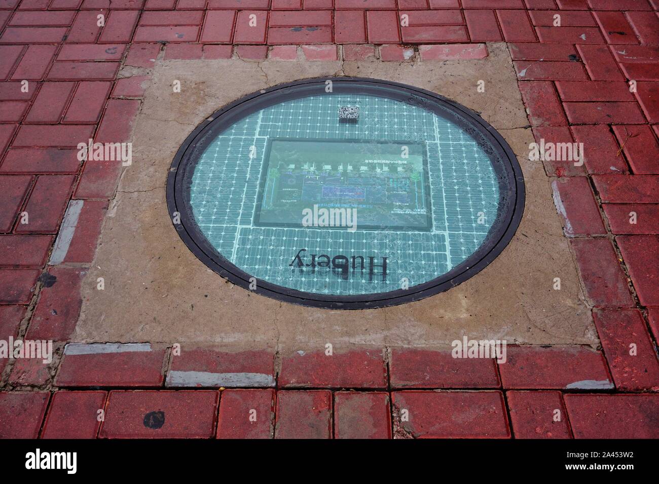 A smart well lid appears and attract attention of pedestrian at West ...