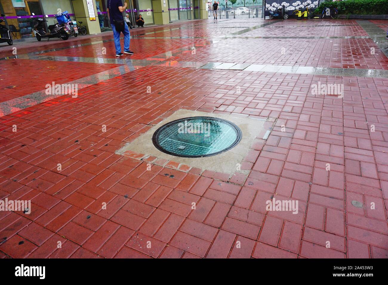 A smart well lid appears and attract attention of pedestrian at West ...