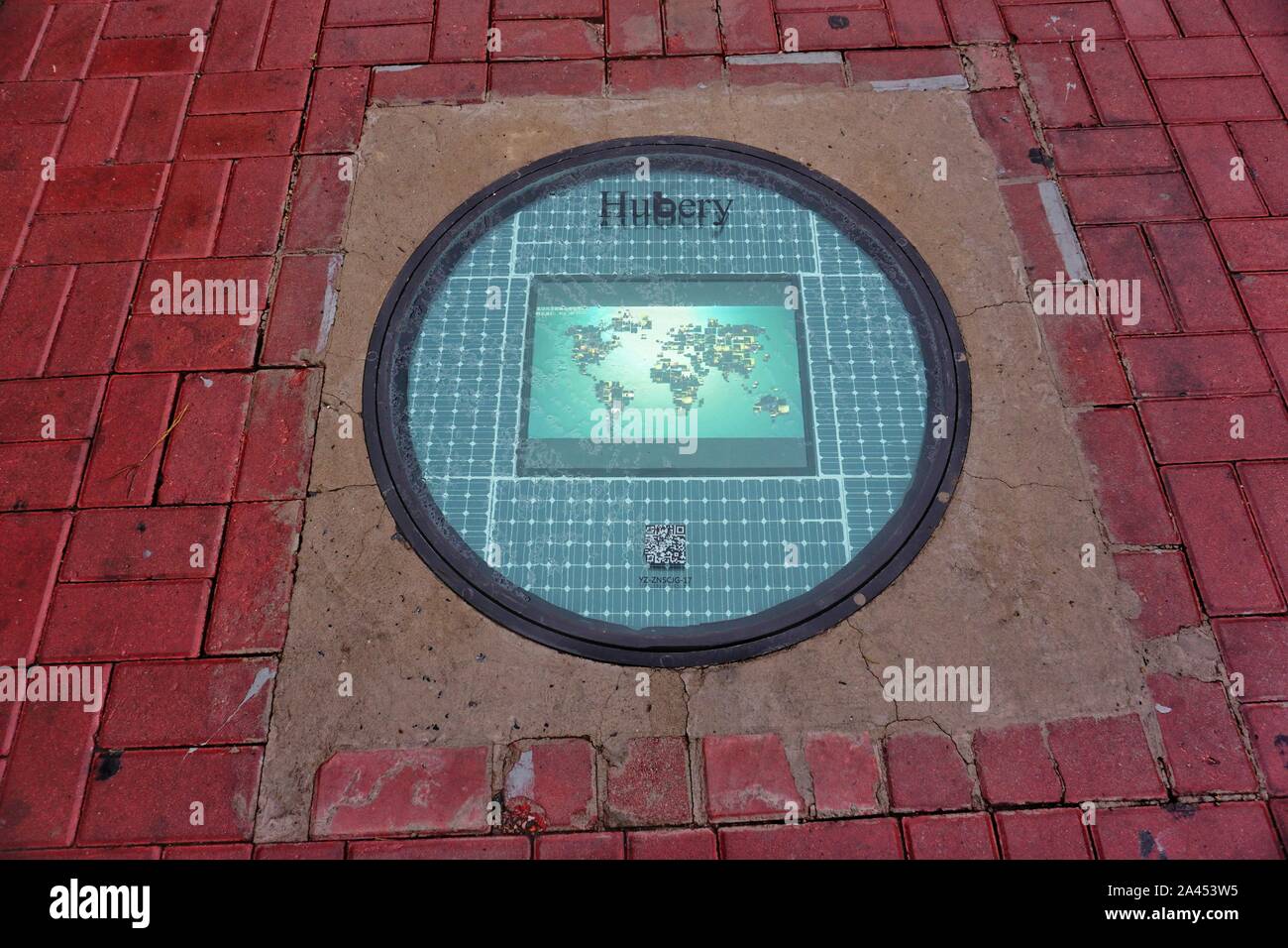 A smart well lid appears and attract attention of pedestrian at West ...
