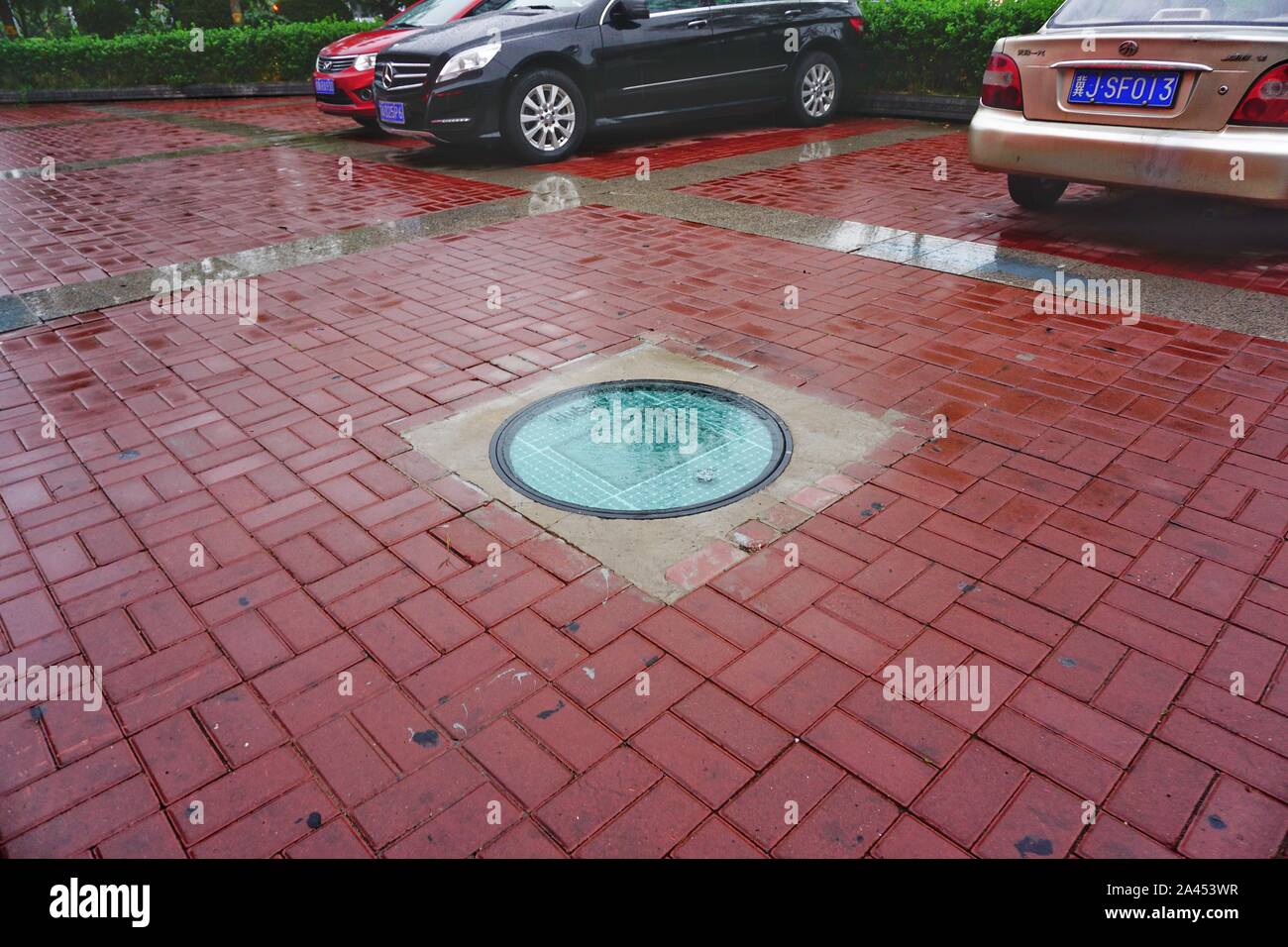 A smart well lid appears and attract attention of pedestrian at West ...