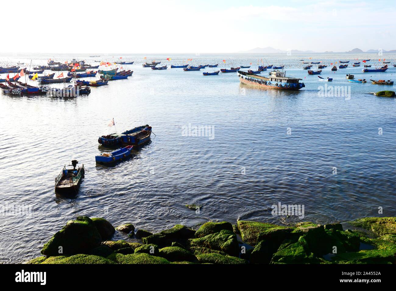 Fishing boats float around Goqi Island, the center of China's largest ...