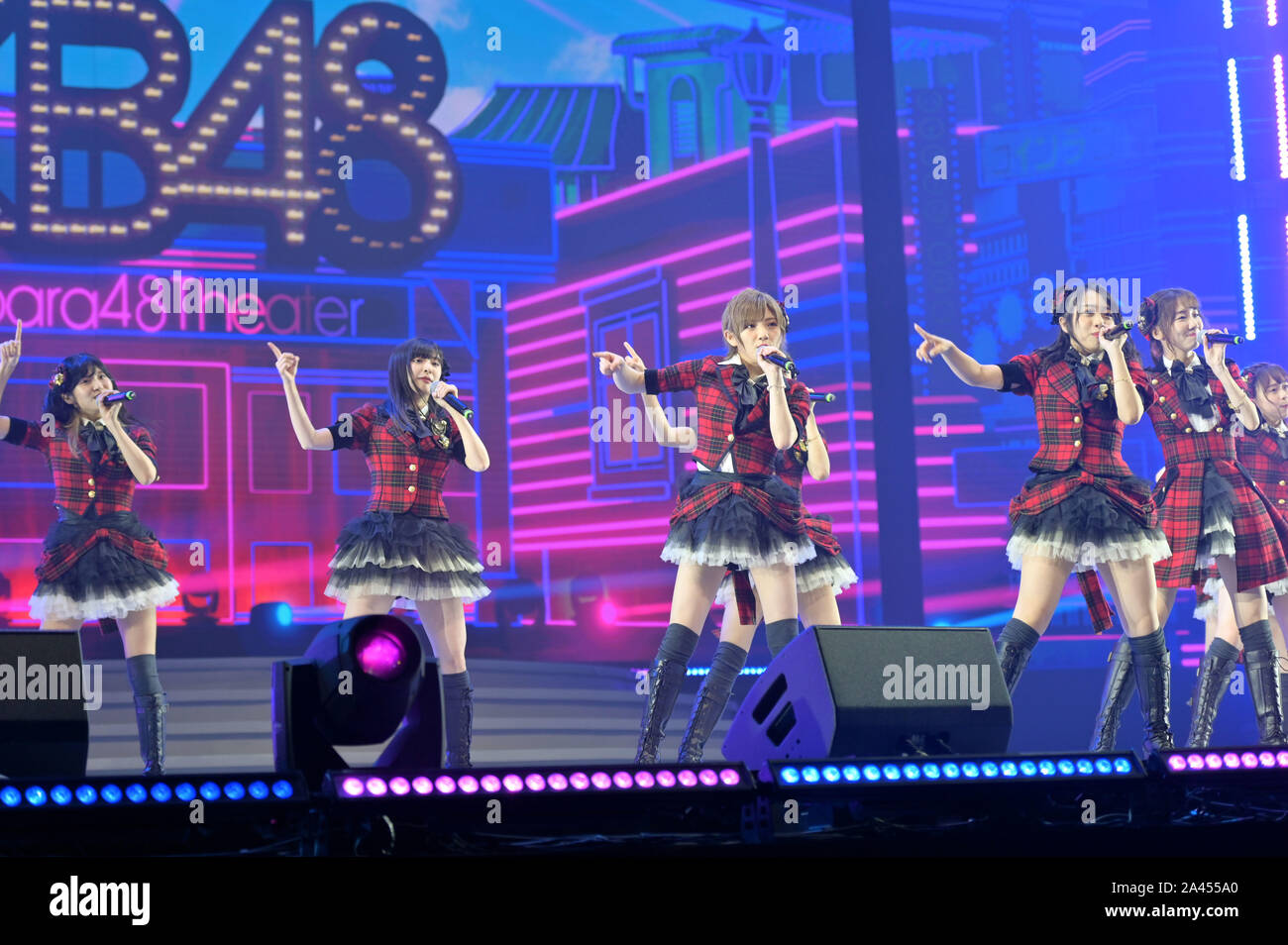 Members of Japanese idol girl group AKB48 and its international sister groups perform during the ...